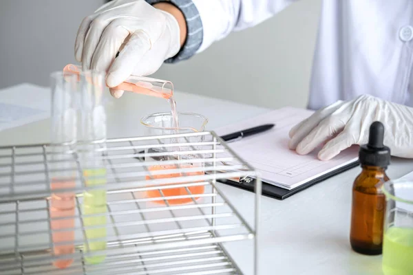 Scientist Medical Lab Coat Holding Test Tube Reagent Mixing Reagents ...