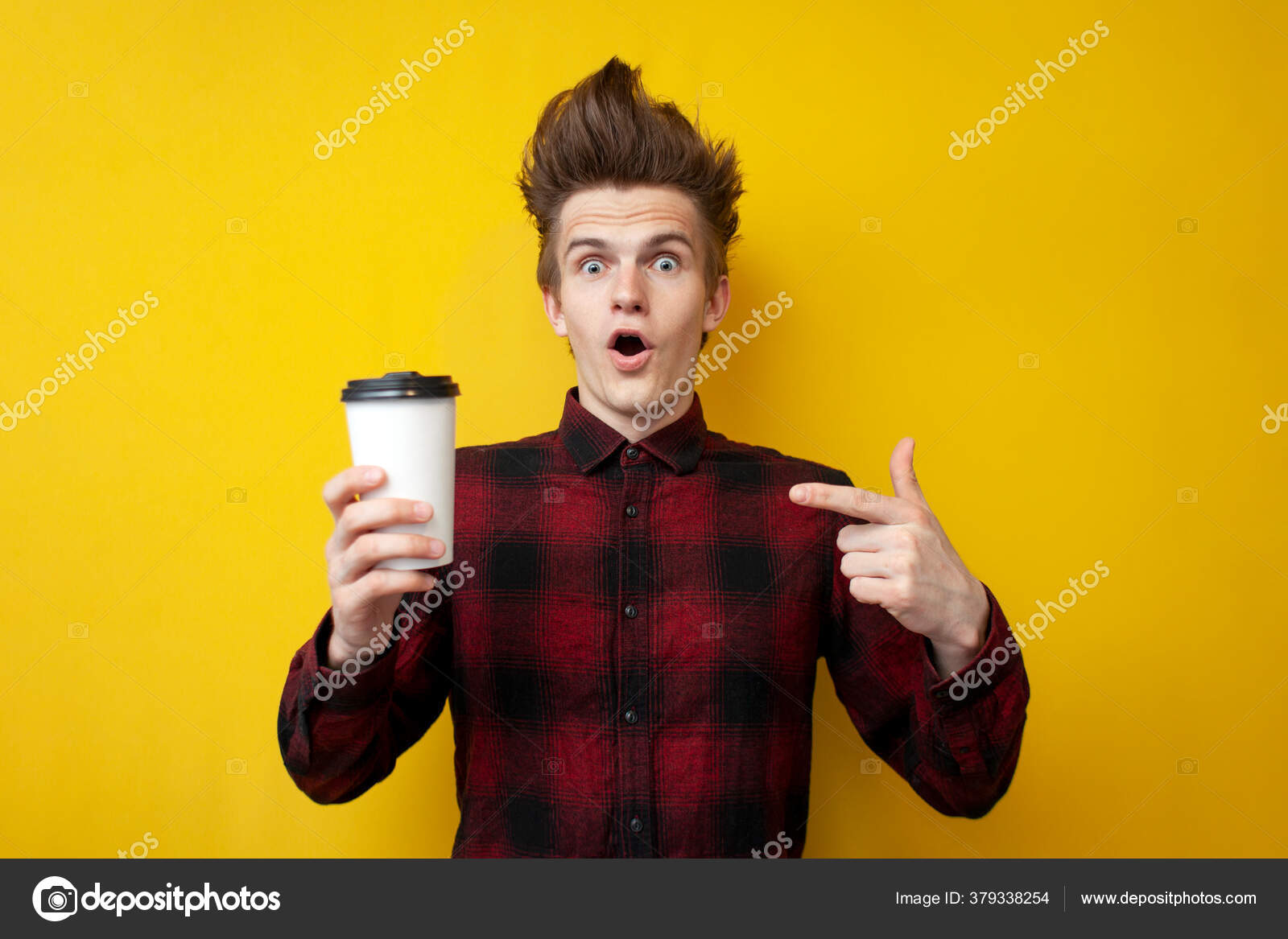 Young Shocked Guy Drinks Invigorating Coffee Surprised Yellow Isolated ...