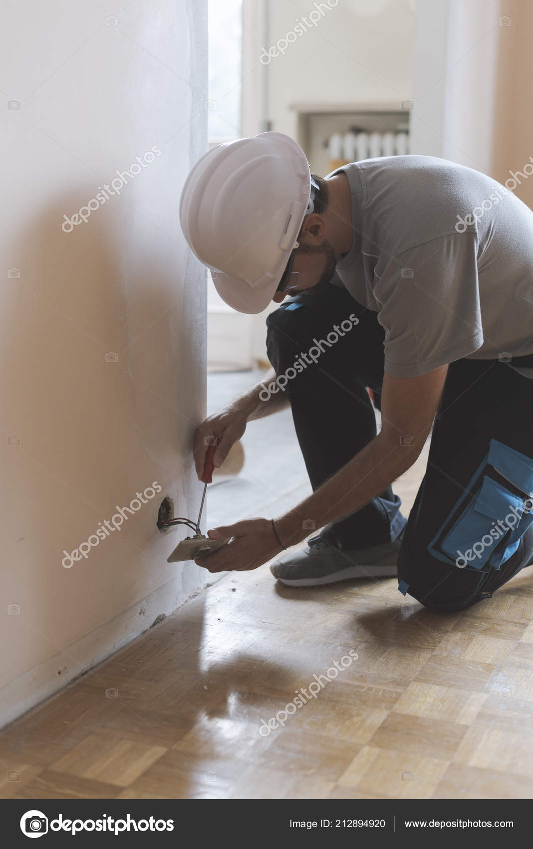 Professional Electrician Installing Sockets Using Screwdriver Home ...