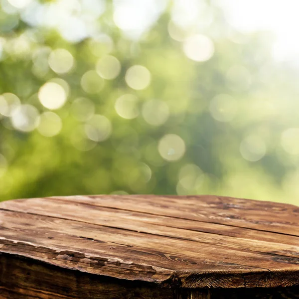 Empty Wooden Table Blurred Natural Background Stock Photo by ©kwasny222 ...