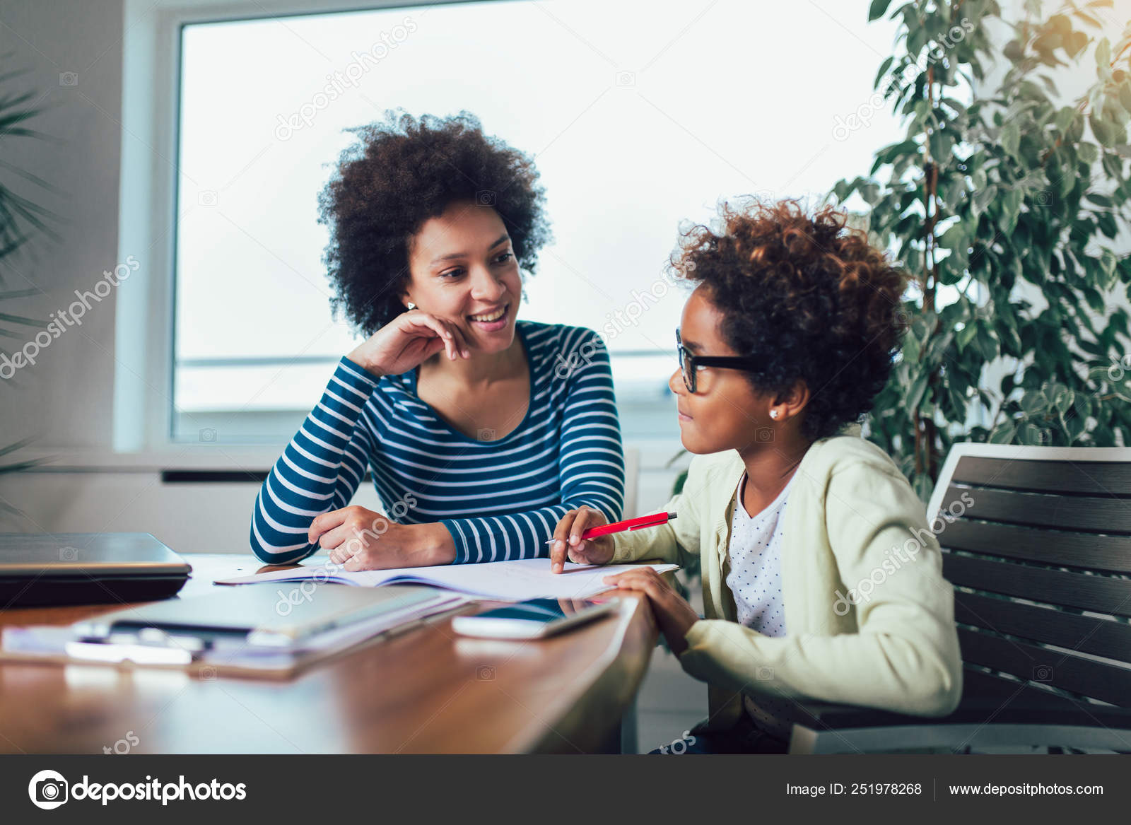 Mother and daughter doing homework learning to calculate — Stock Photo ...