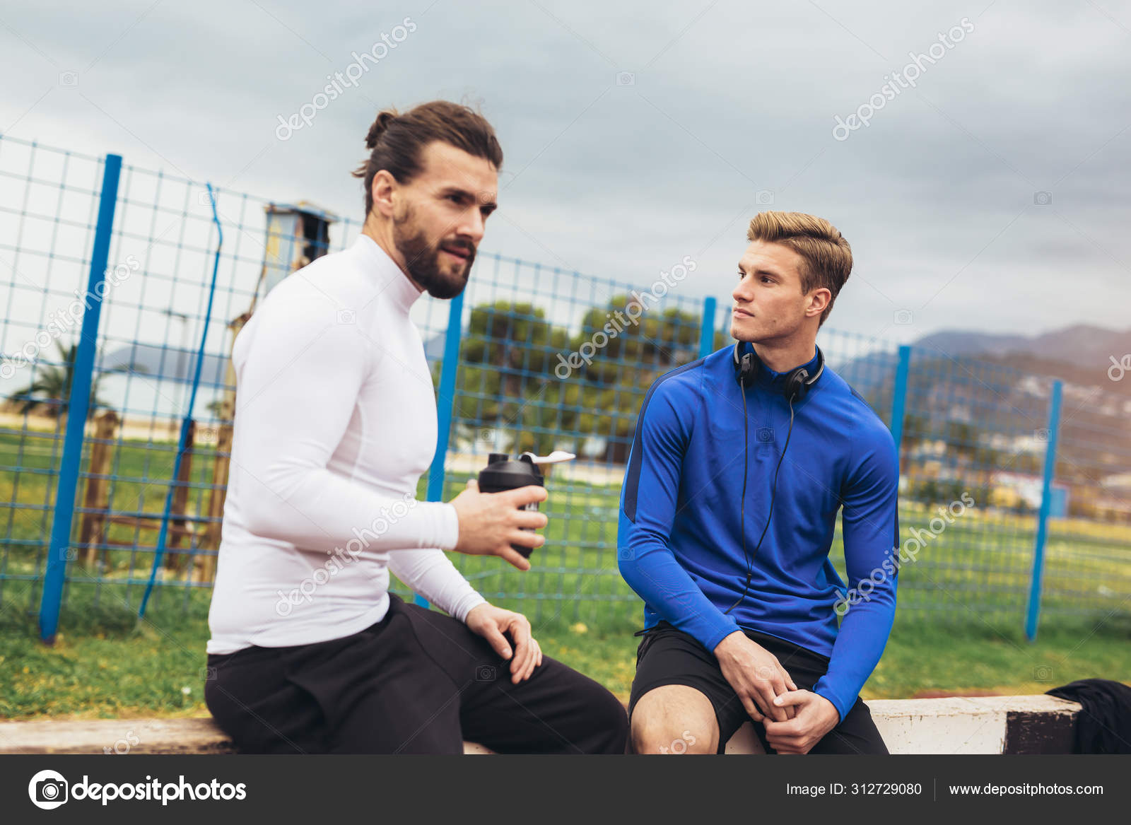 Young athletes practicing a run on athletics stadium track, havi Stock ...