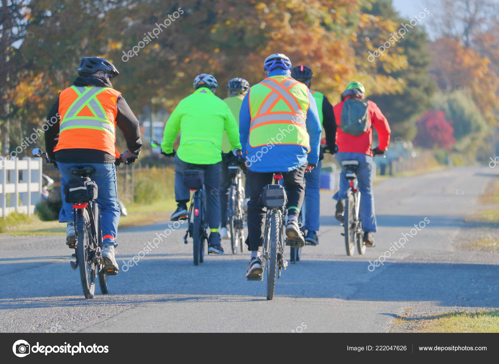 Group Cyclist Wear Bright Reflective Clothing Ensure Visibility Safety ...