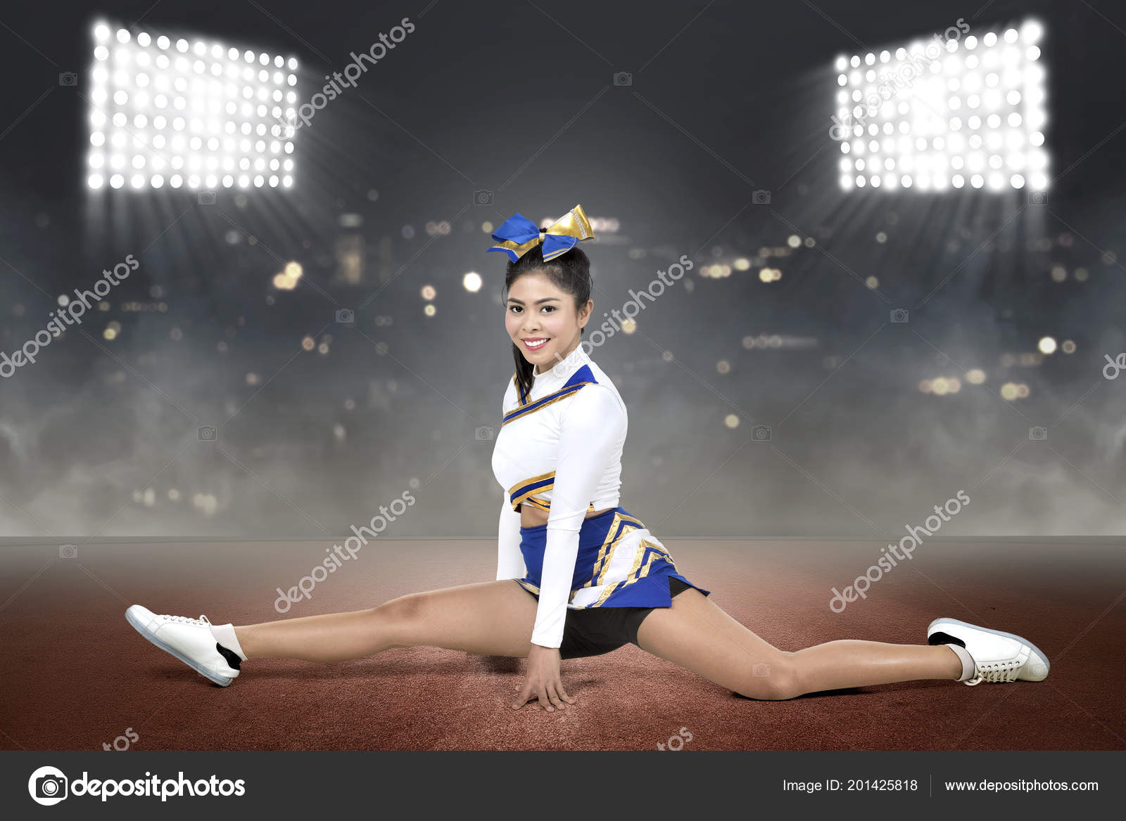 Beautiful Asian Cheerleader Doing Splits Spot Lights Background Stock ...