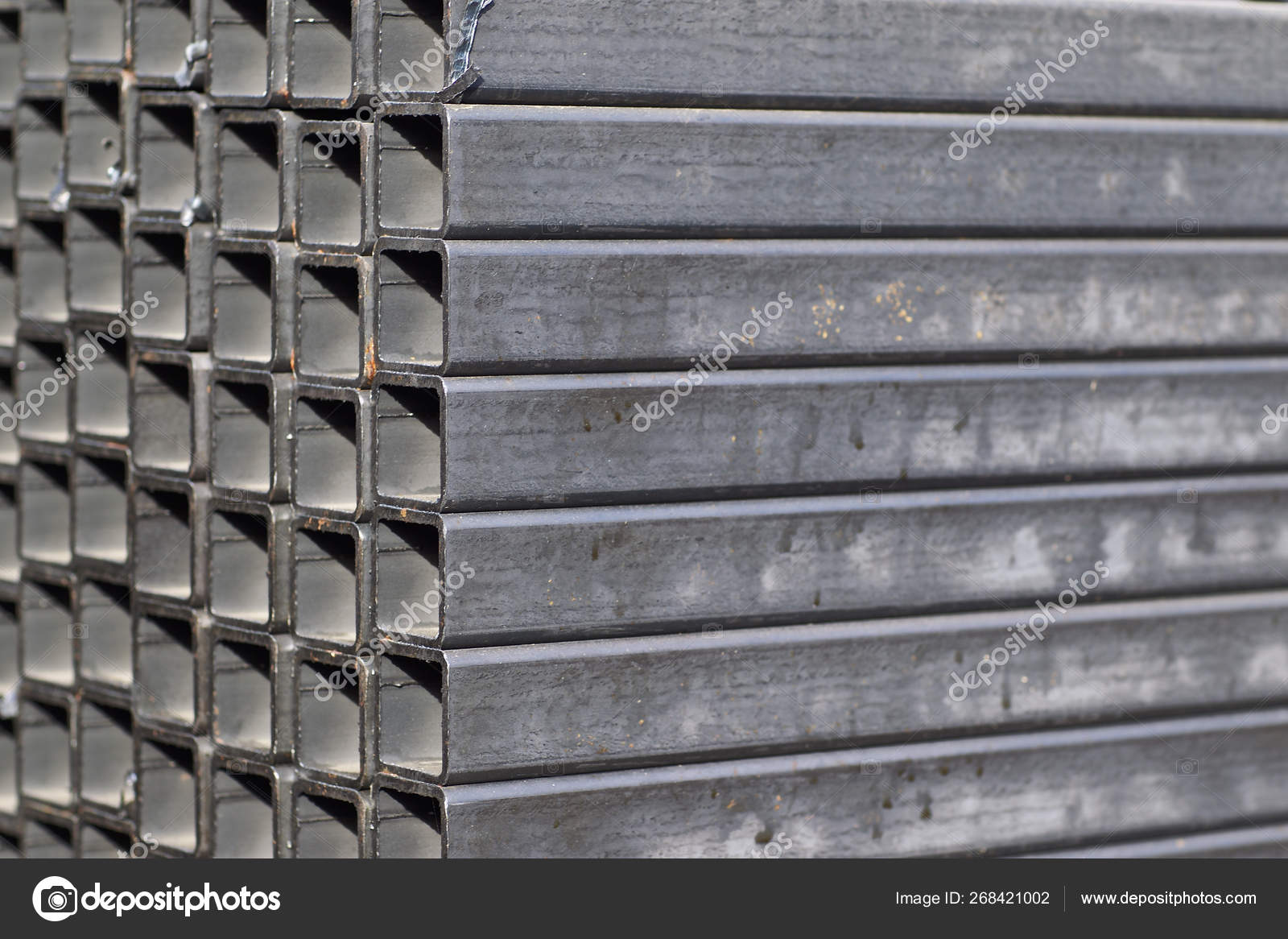 Metal profile pipe of rectangular cross section in packs at the ...