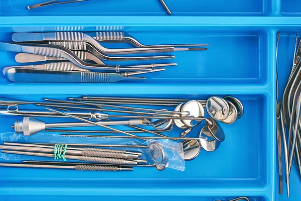 Otorhinolaryngology or ENT surgery instruments in a blue medical box ...