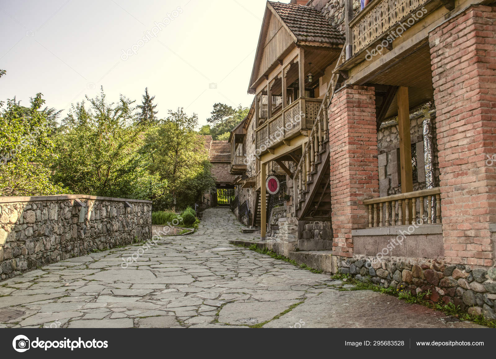 Small shops on the street Sharambeyan in old houses made of rough stone ...