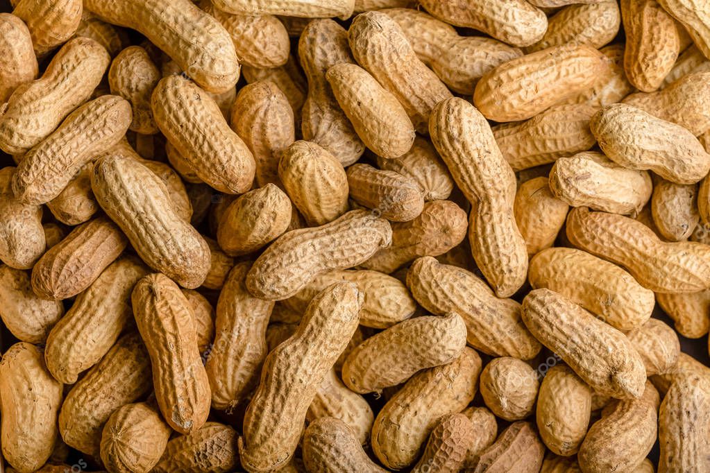 Textura de fondo de cacahuetes naturales saludables o cacahuetes en sus ...