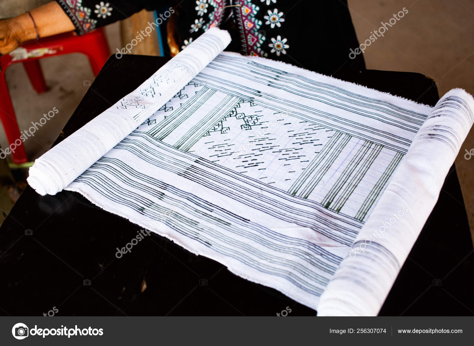 Hmong woman drawing the patterns for beautiful handmade fabrics Stock ...