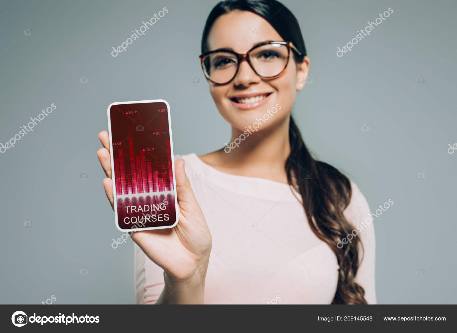 Woman Showing Smartphone Trading Courses Isolated Grey — Stock Photo ...