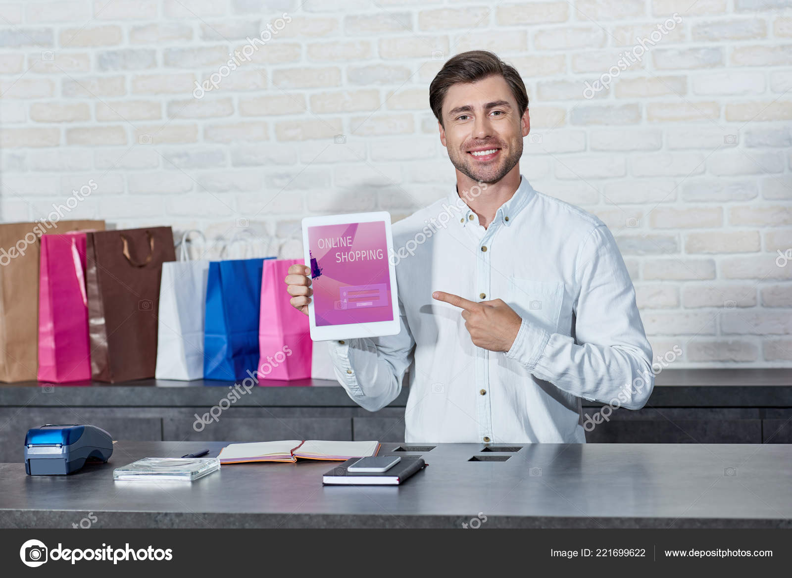 Handsome Young Salesman Pointing Digital Tablet Online Shopping ...