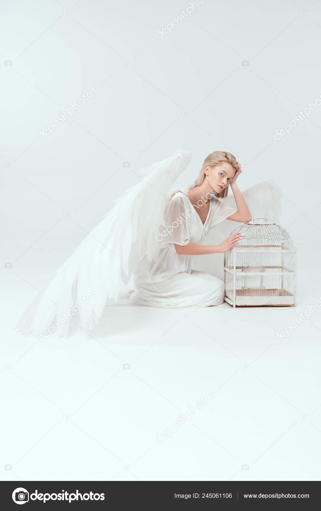 Beautiful Woman Angel Costume Wings Looking Camera Posing Bird Cage ... Beautiful Woman Angel Costume Wings Looking Camera Posing Bird Cage ...