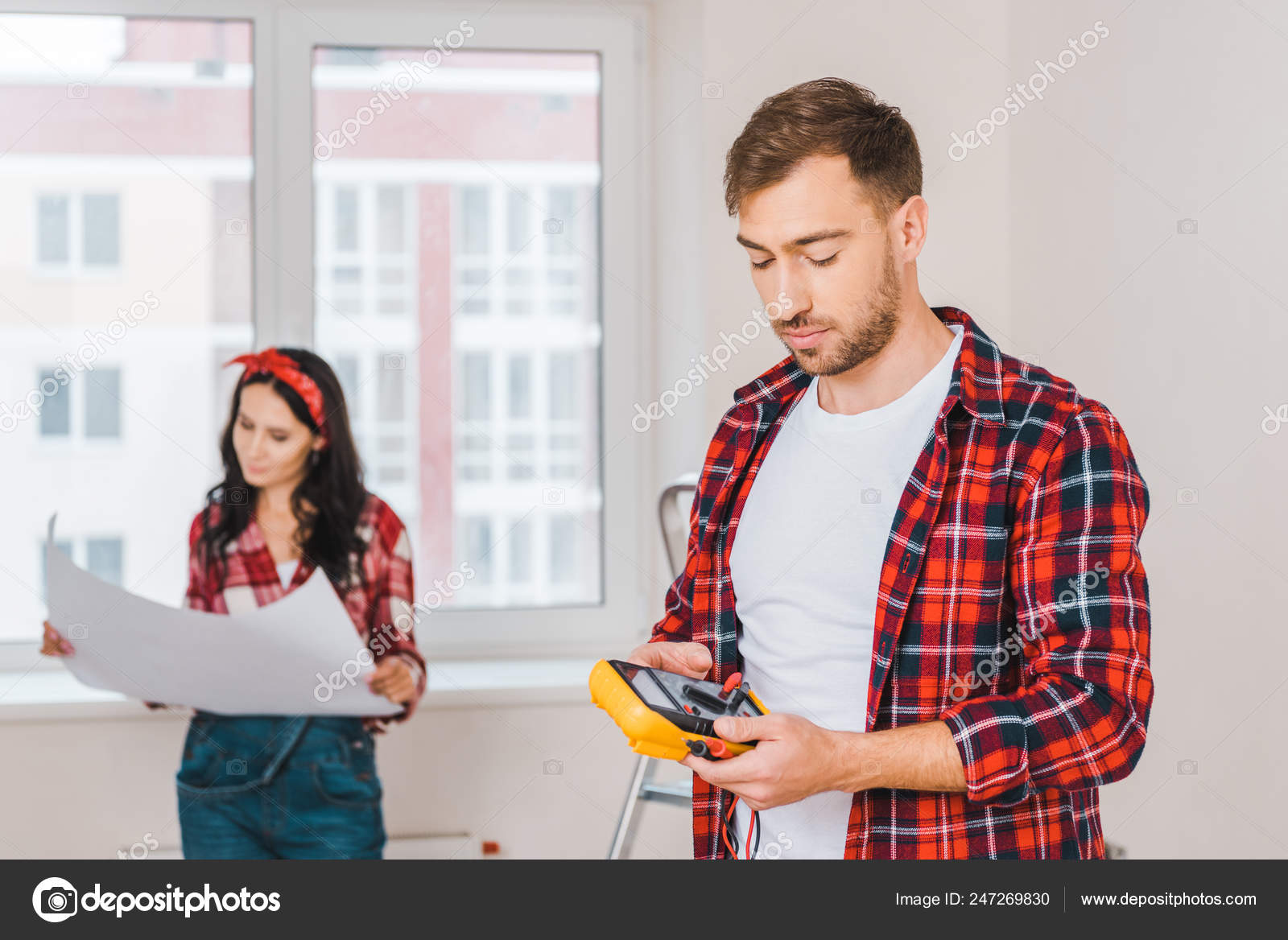 Selective Focus Handsome Man Holding Digital Multimeter Woman Holding ...