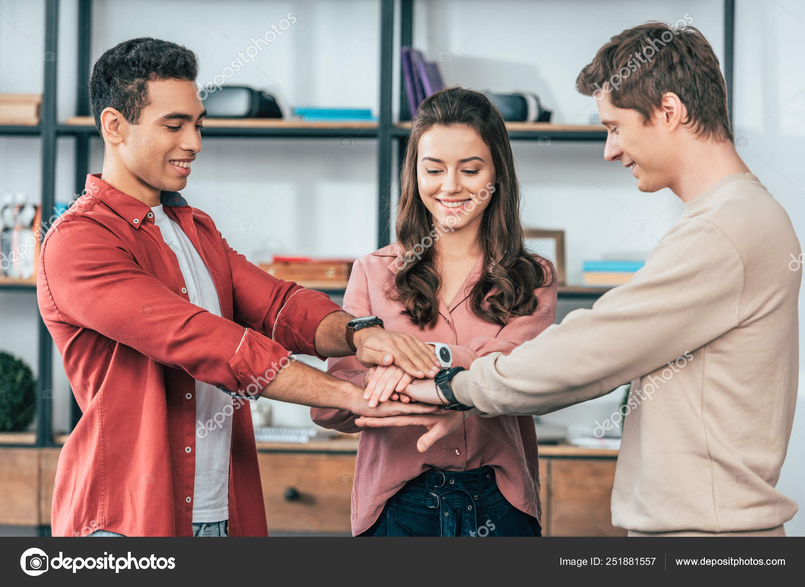 Three Multicultural Friends Stacking Hands Together Smile Home Stock ...
