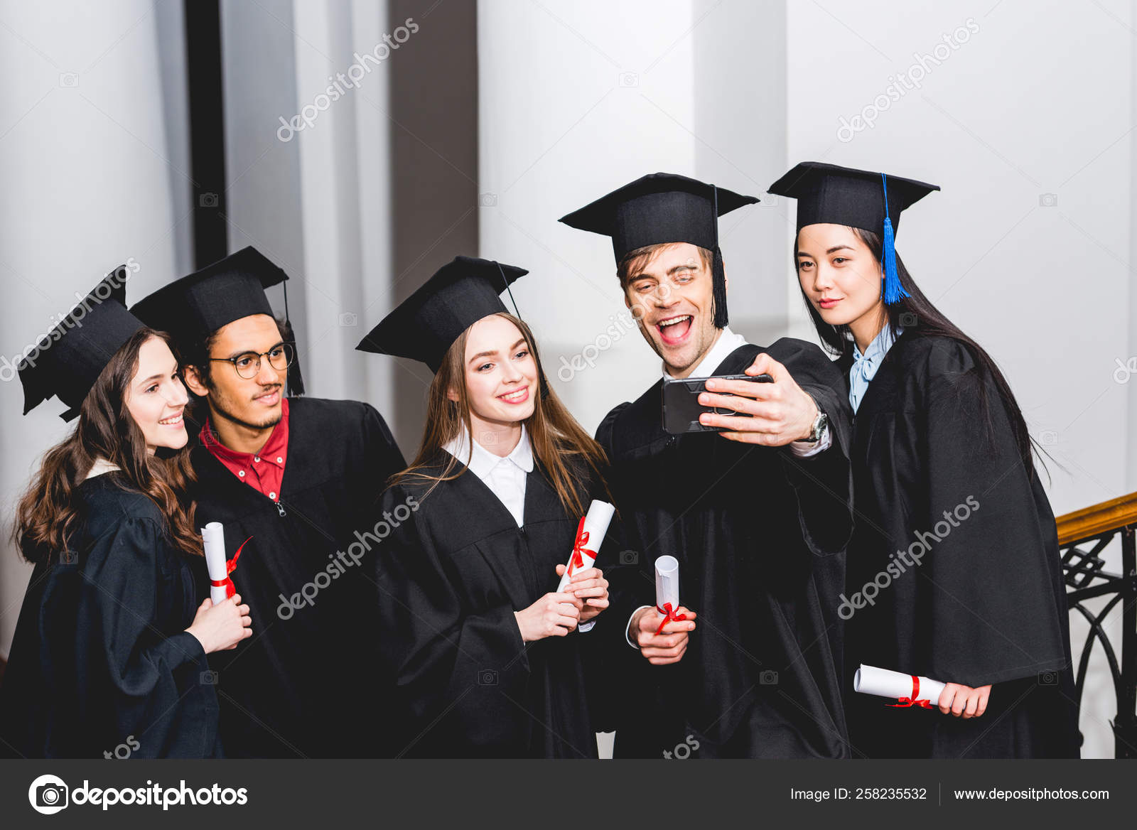 Cheerful Students Graduation Gowns Taking Selfie Smiling While Holding ...
