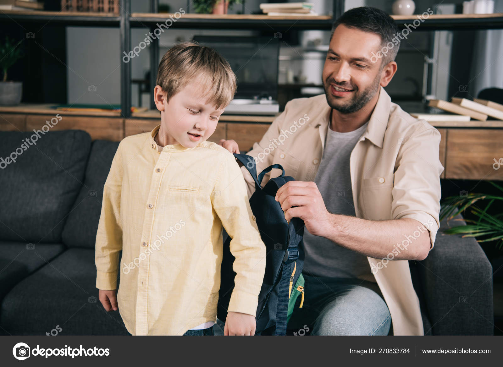 Smiling Dad Helping Cute Boy Putting Backpack Home — Stock Photo ...