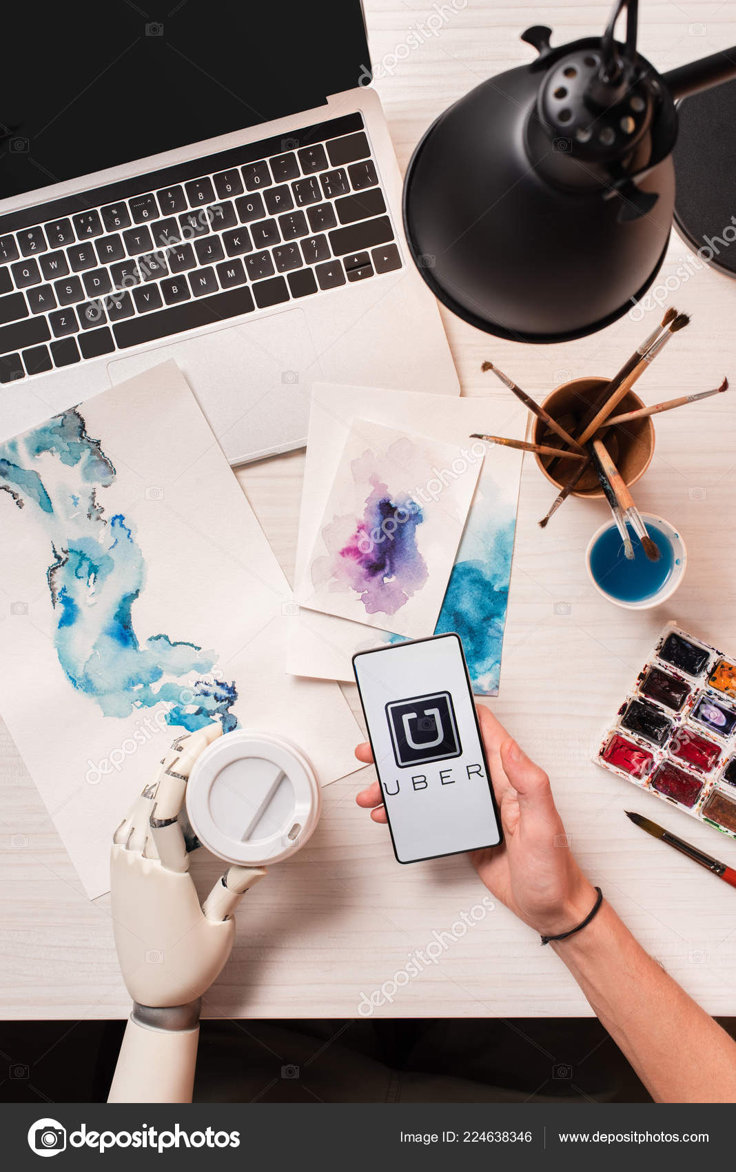 Cropped View Designer Office Desk Robot Hand Holding Smartphone Uber ...