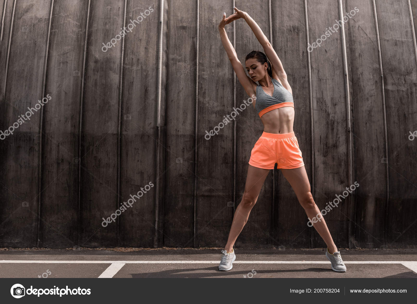 Athletic Woman Training Stretching Arms — Stock Photo © AllaSerebrina ...