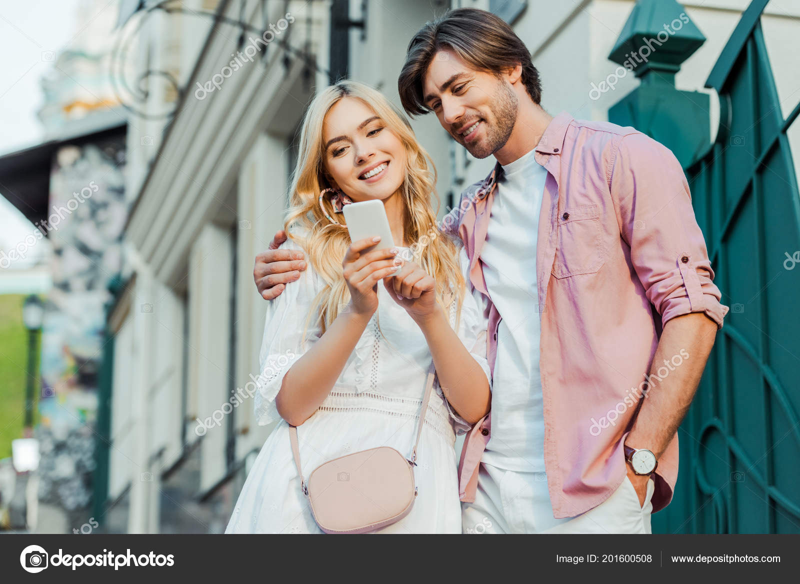 Portrait Smiling Young Couple Using Smartphone Together Street — Stock ...