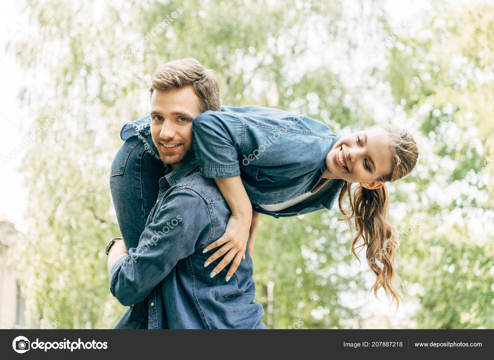 Handsome Young Man Carrying His Smiling Girlfriend Shoulder Park Stock