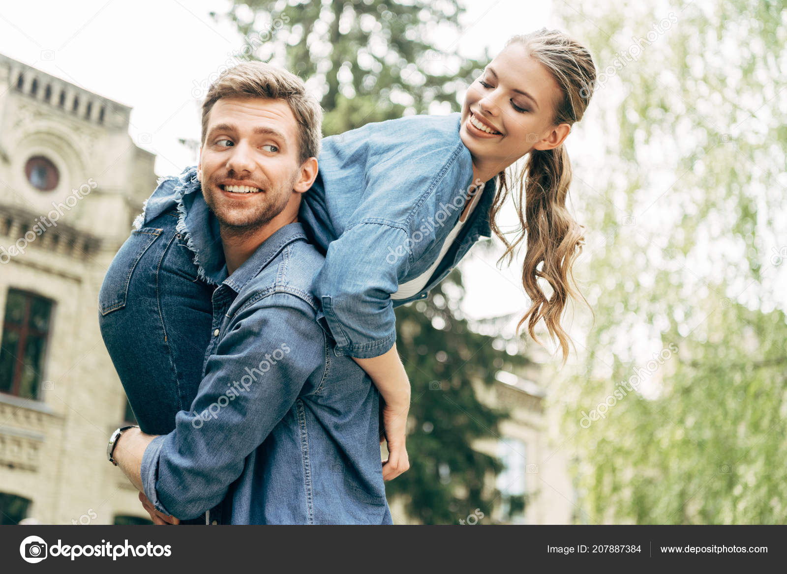 Guy Carrying Girl Over Shoulder