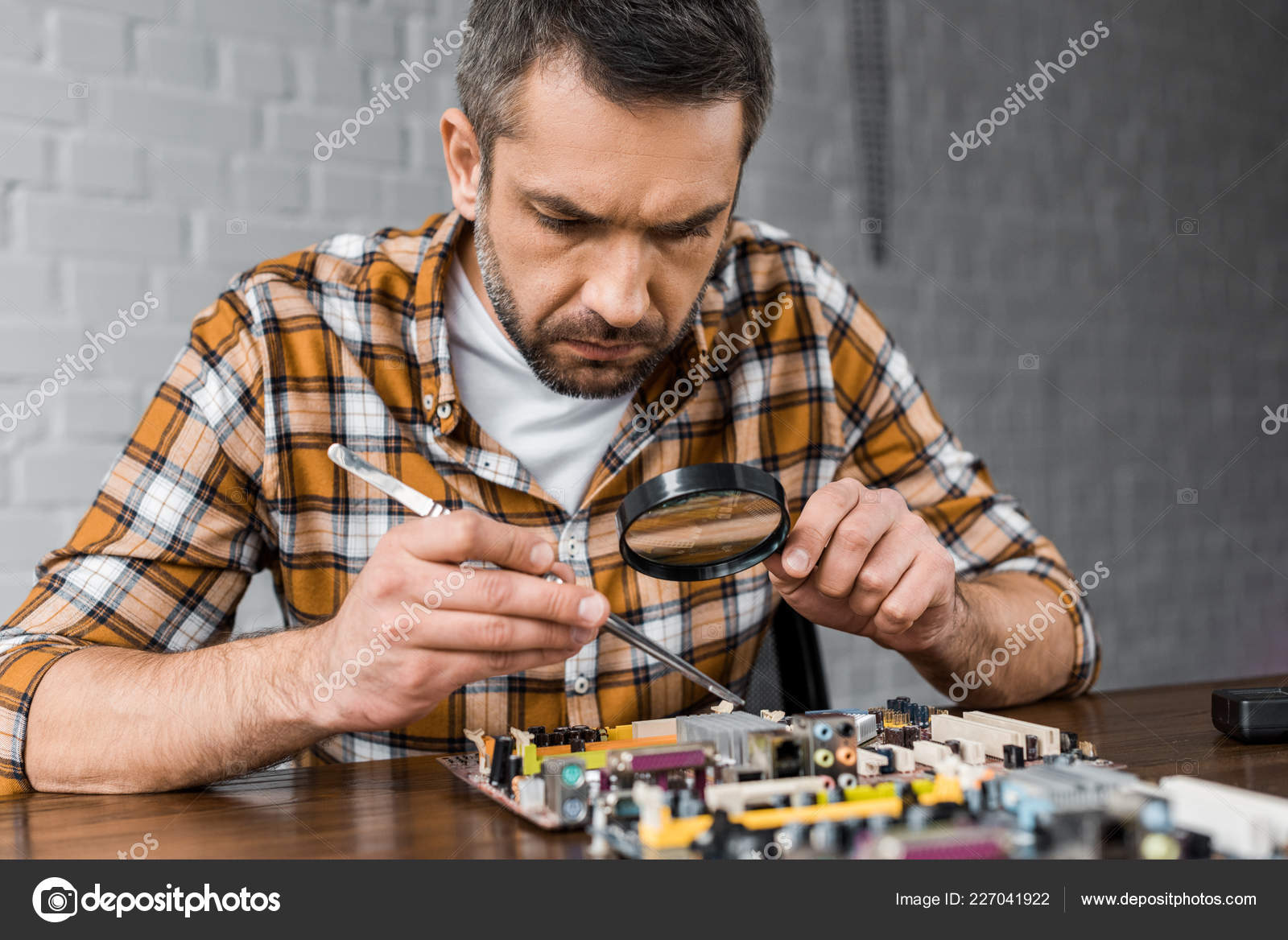 Close Portrait Concentrated Electronics Engineer Tweezers Magnifying ...