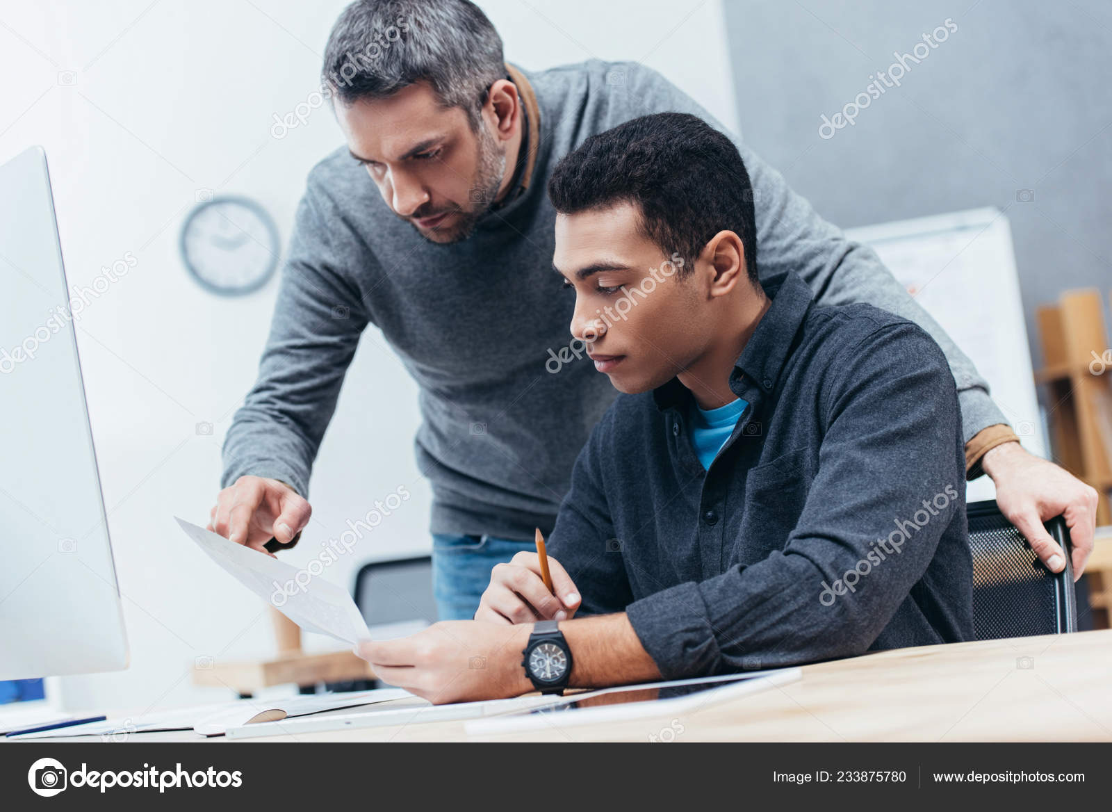Concentrated Business Colleagues Discussing Papers Workplace — Stock ... Concentrated Business Colleagues Discussing Papers Workplace — Stock ...