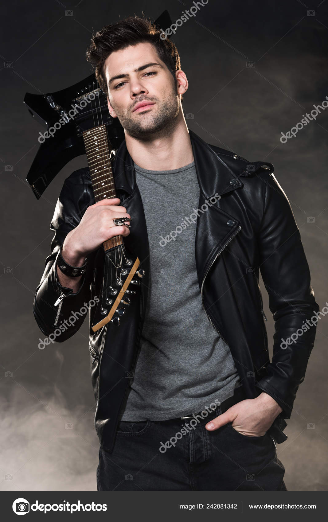 Handsome Rocker Holding Electric Guitar Looking Camera Dark Smoky ...
