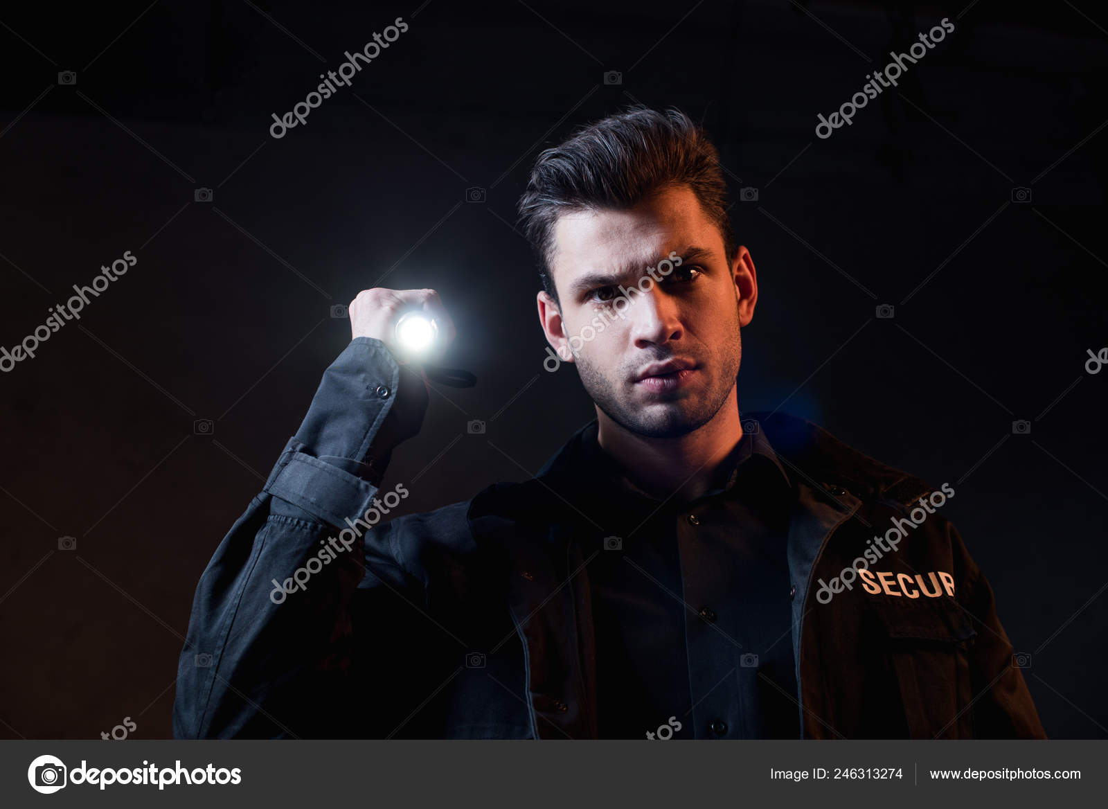 Guard Uniform Holding Flashlight Looking Camera Stock Photo by ...