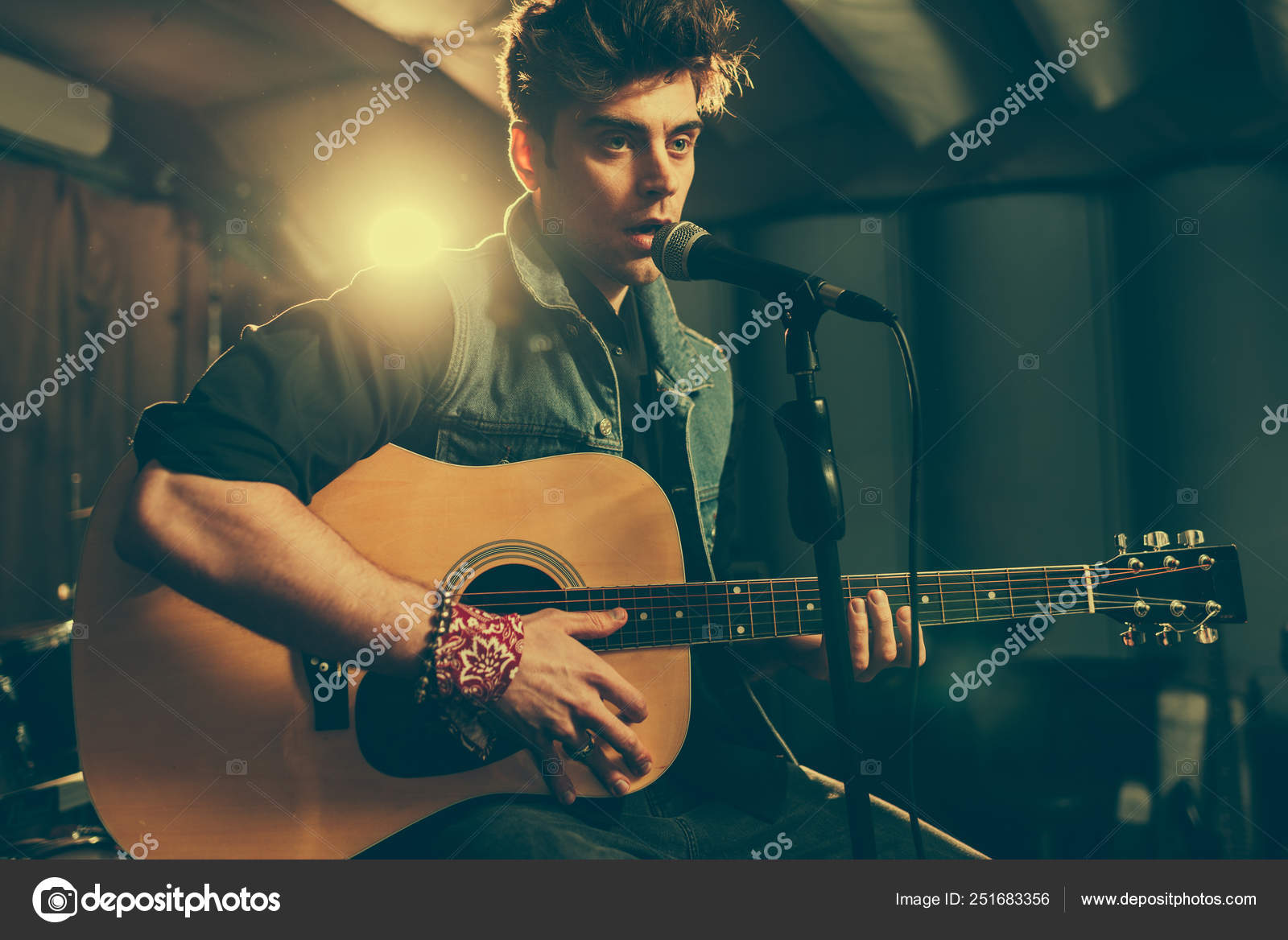 Good Looking Musician Singing Microphone While Playing Acoustic Guitar ...