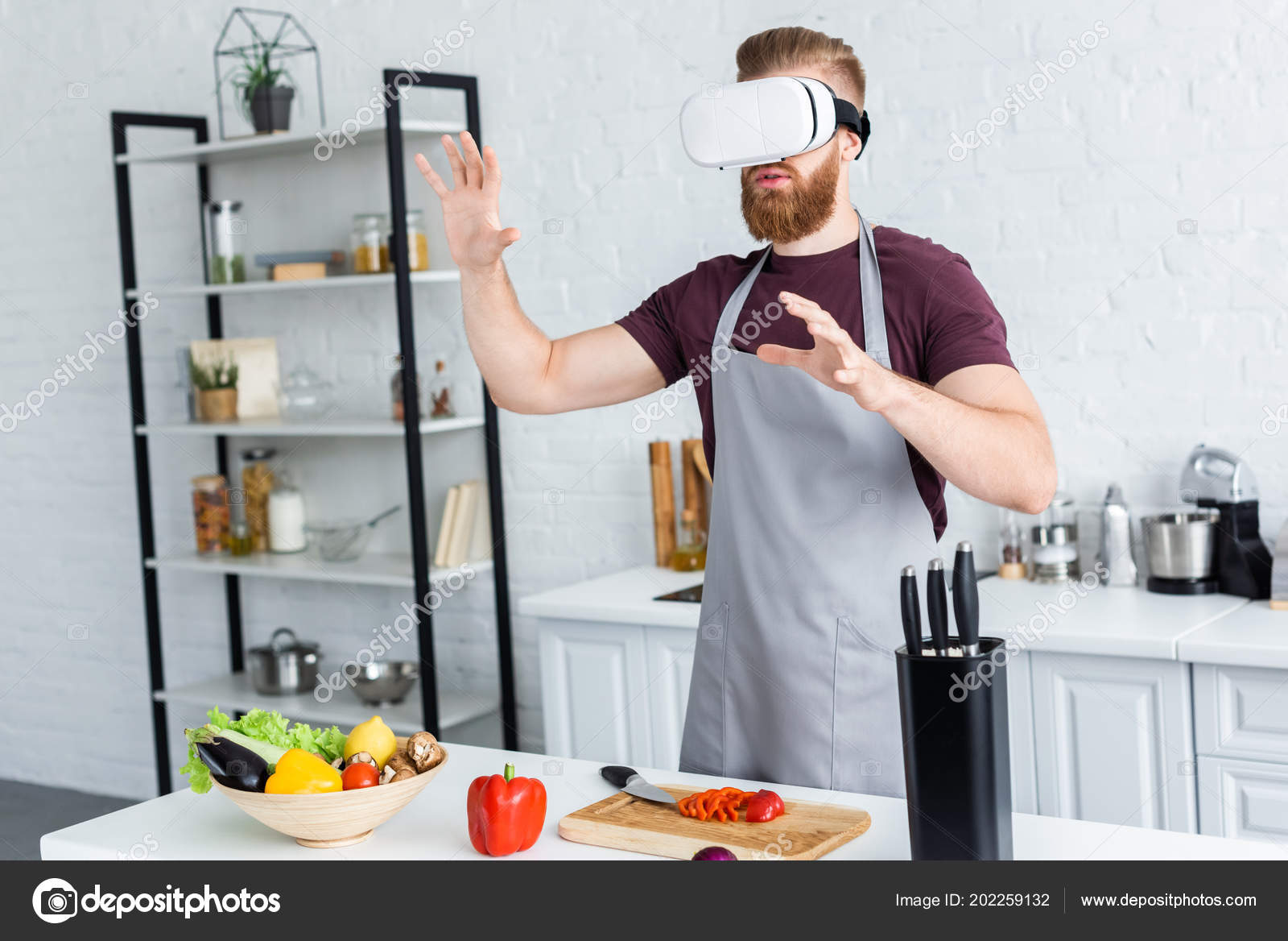 Young Man Apron Using Virtual Reality Headset While Cooking Kitchen ...
