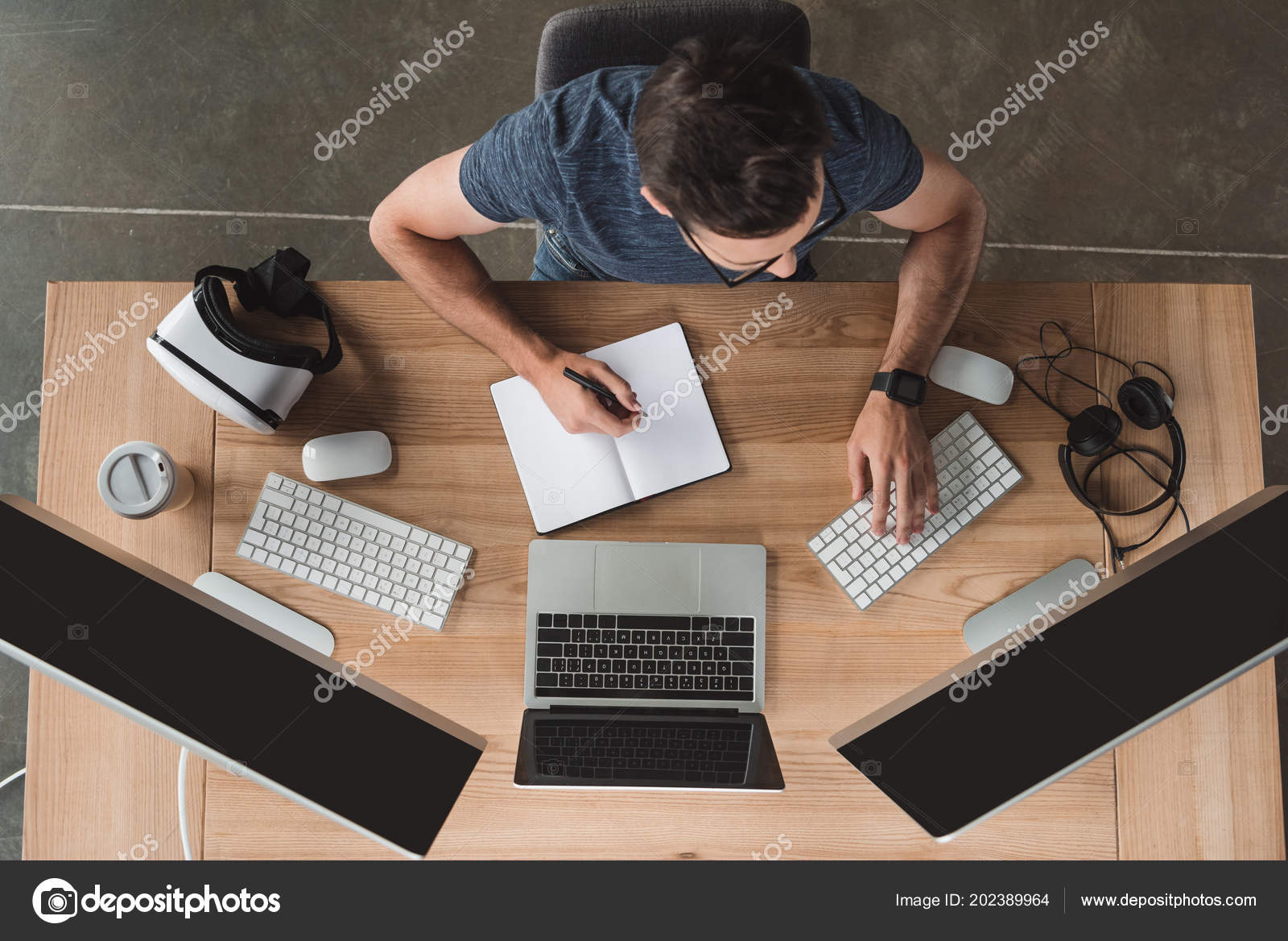 Overhead View Young Programmer Taking Notes Notebook Using Computers ...