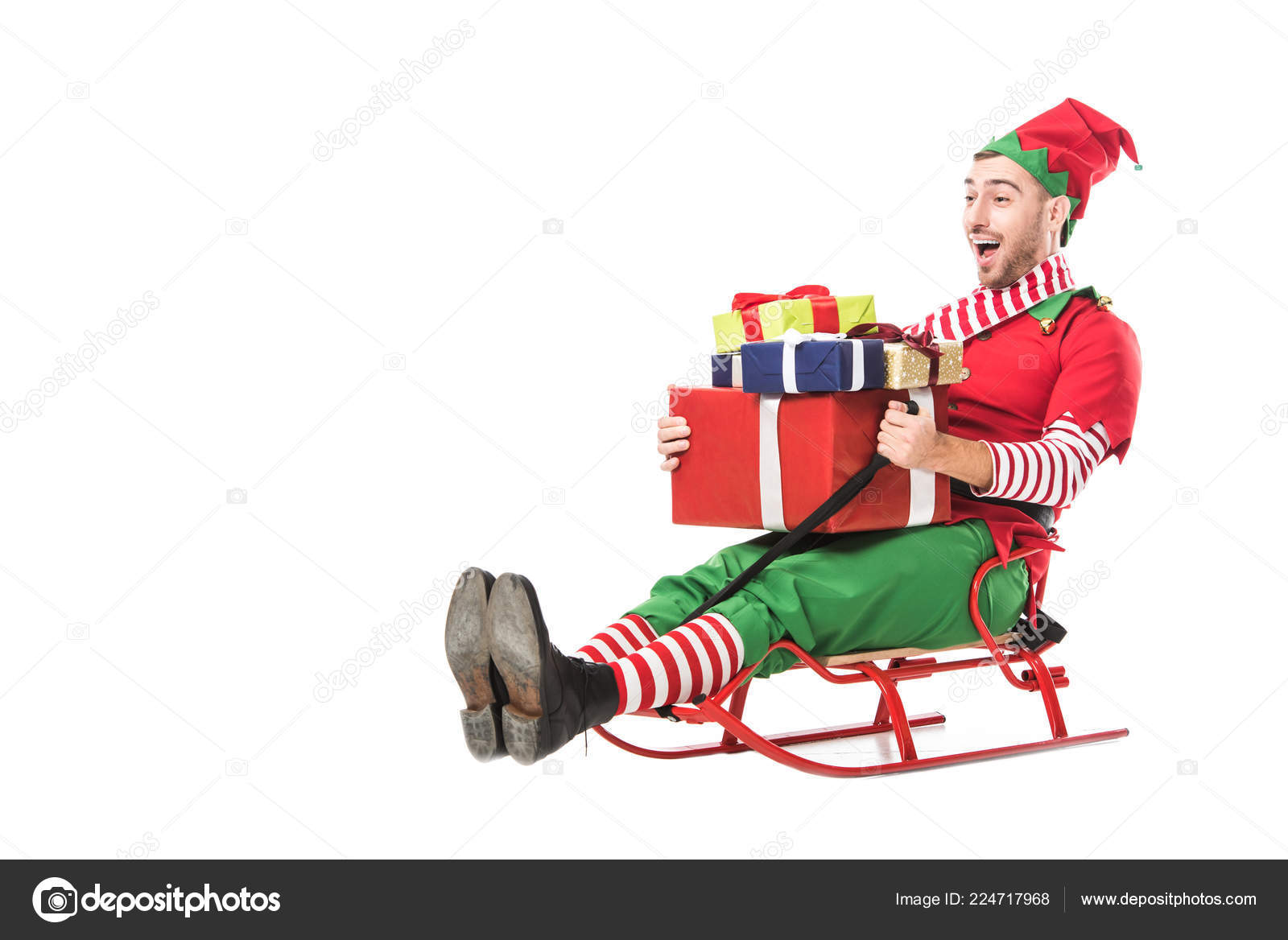 Cheerful Excited Man Christmas Elf Costume Holding Pile Presents Riding ...