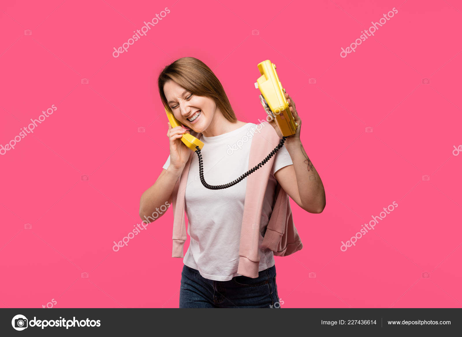 Cheerful Young Woman Talking Rotary Phone Laughing Isolated Pink