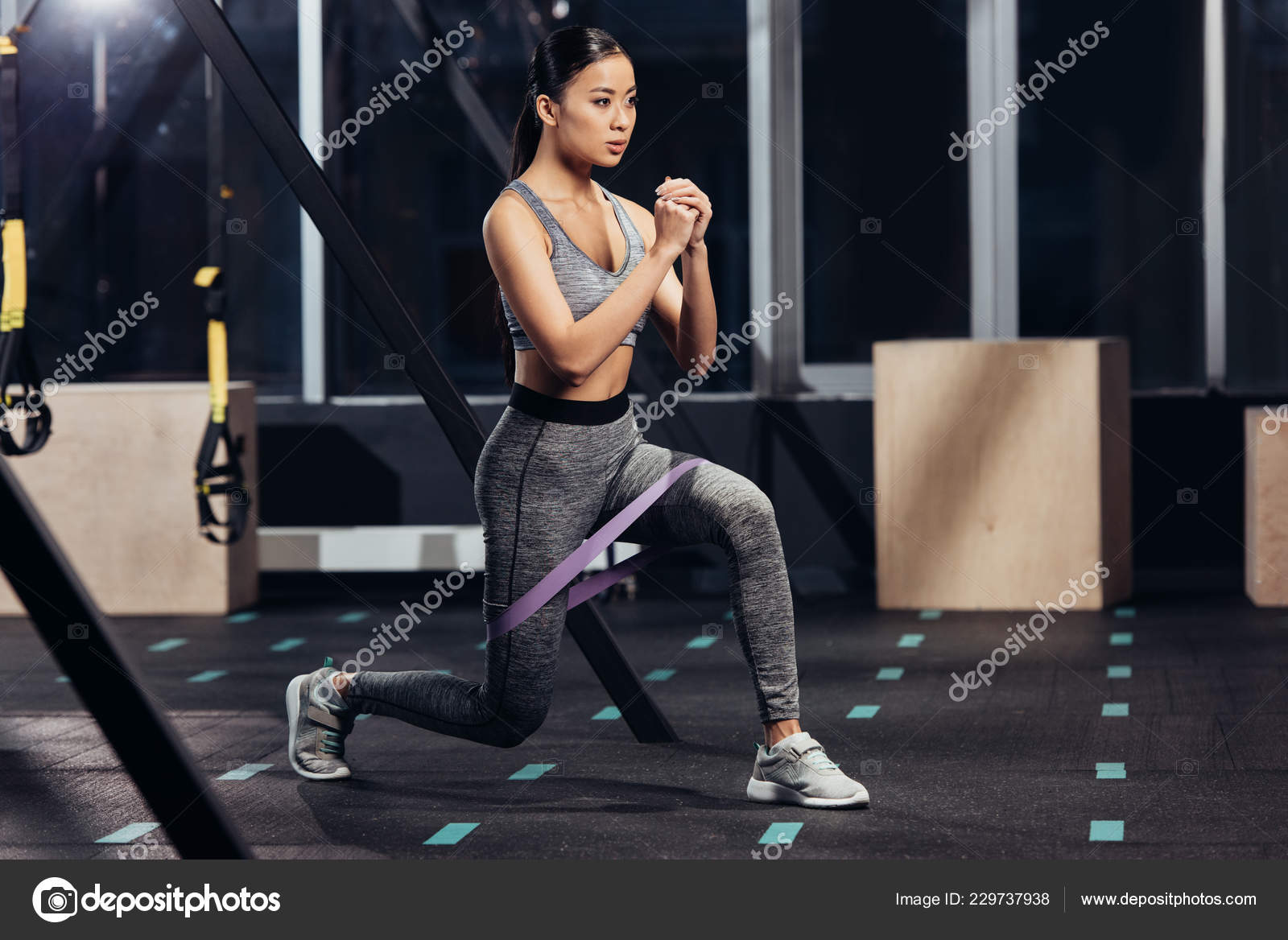 Attractive Asian Girl Training Rubber Resistance Bands Modern Gym ...