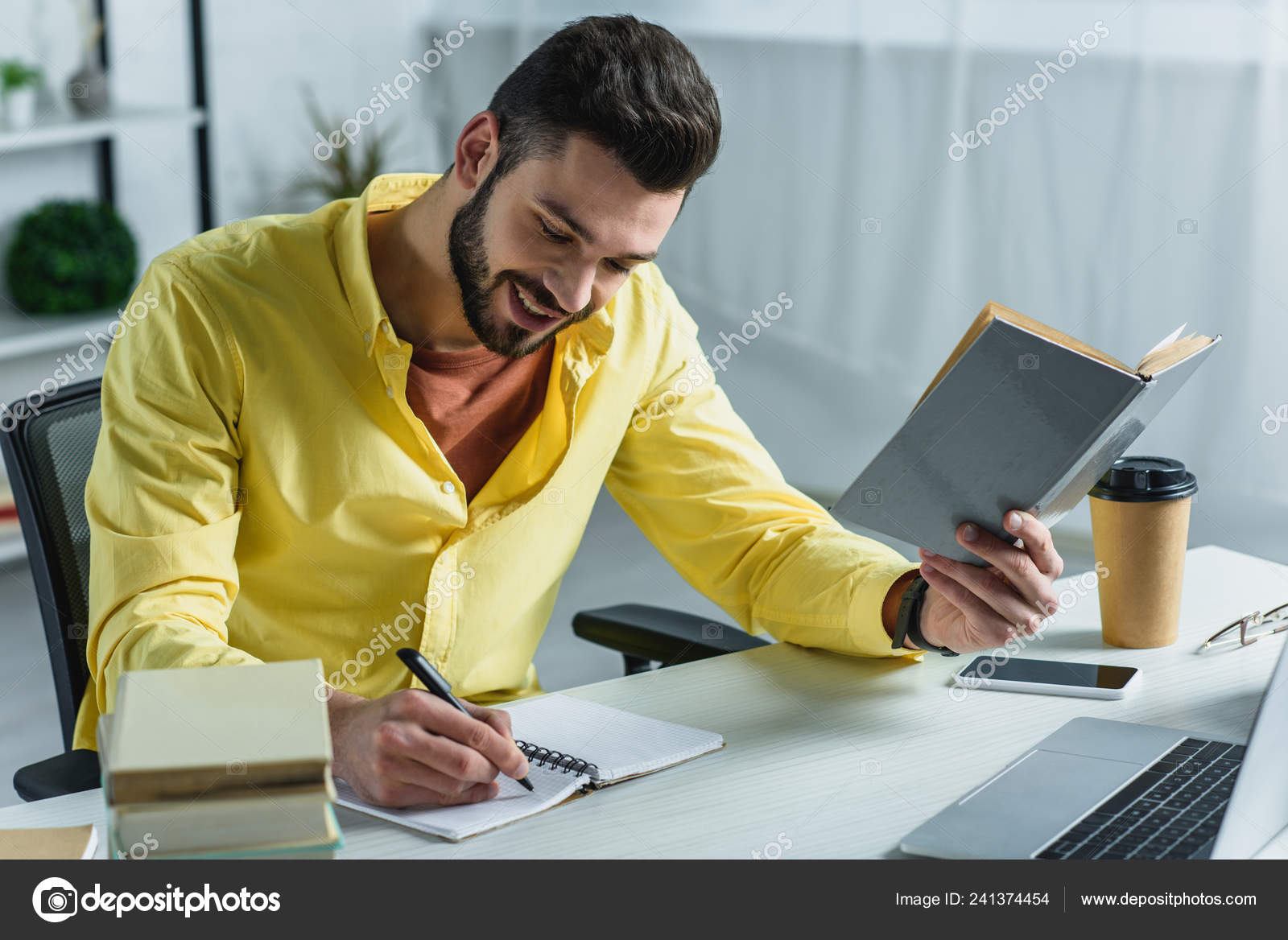 Man Writing A Book