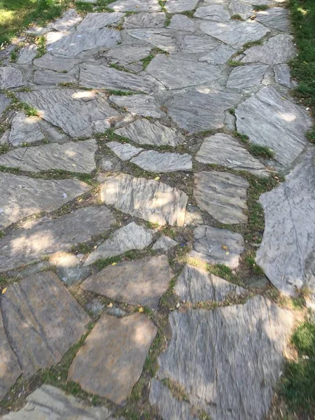Long flagstone path Stock Photos, Royalty Free Long flagstone path ...