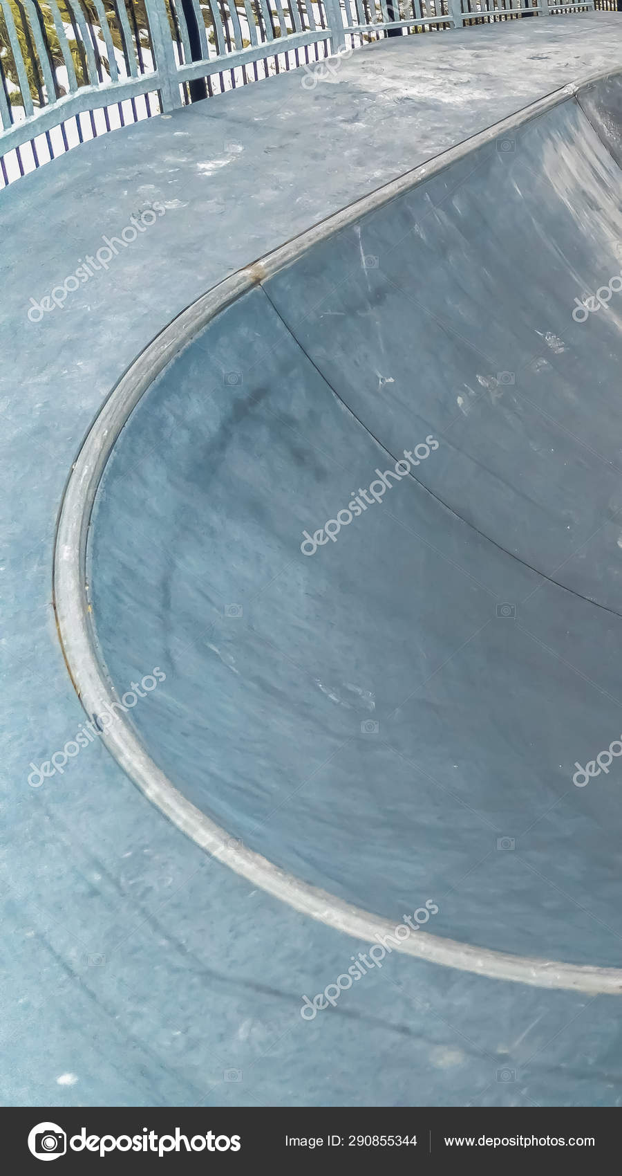 Vertical frame Conctere skate park with close view of the bowl shaped ...