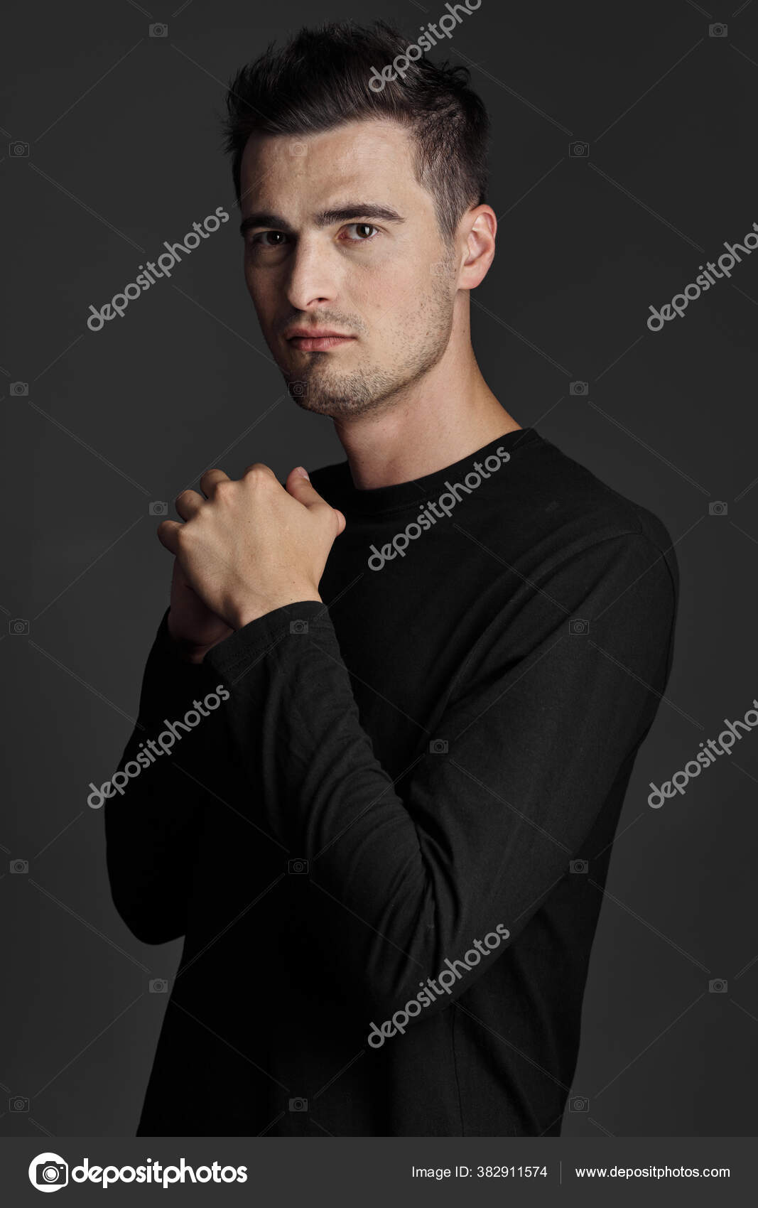 Young Handsome Man Posing Studio Stock Photo by ©ShotStudio 382911574