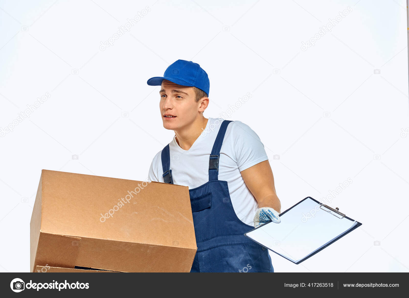 Man worker with box in hands delivery loading service work light ...