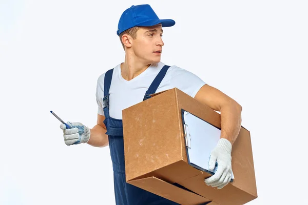 Worker carrying boxes Stock Photos, Royalty Free Worker carrying boxes ...