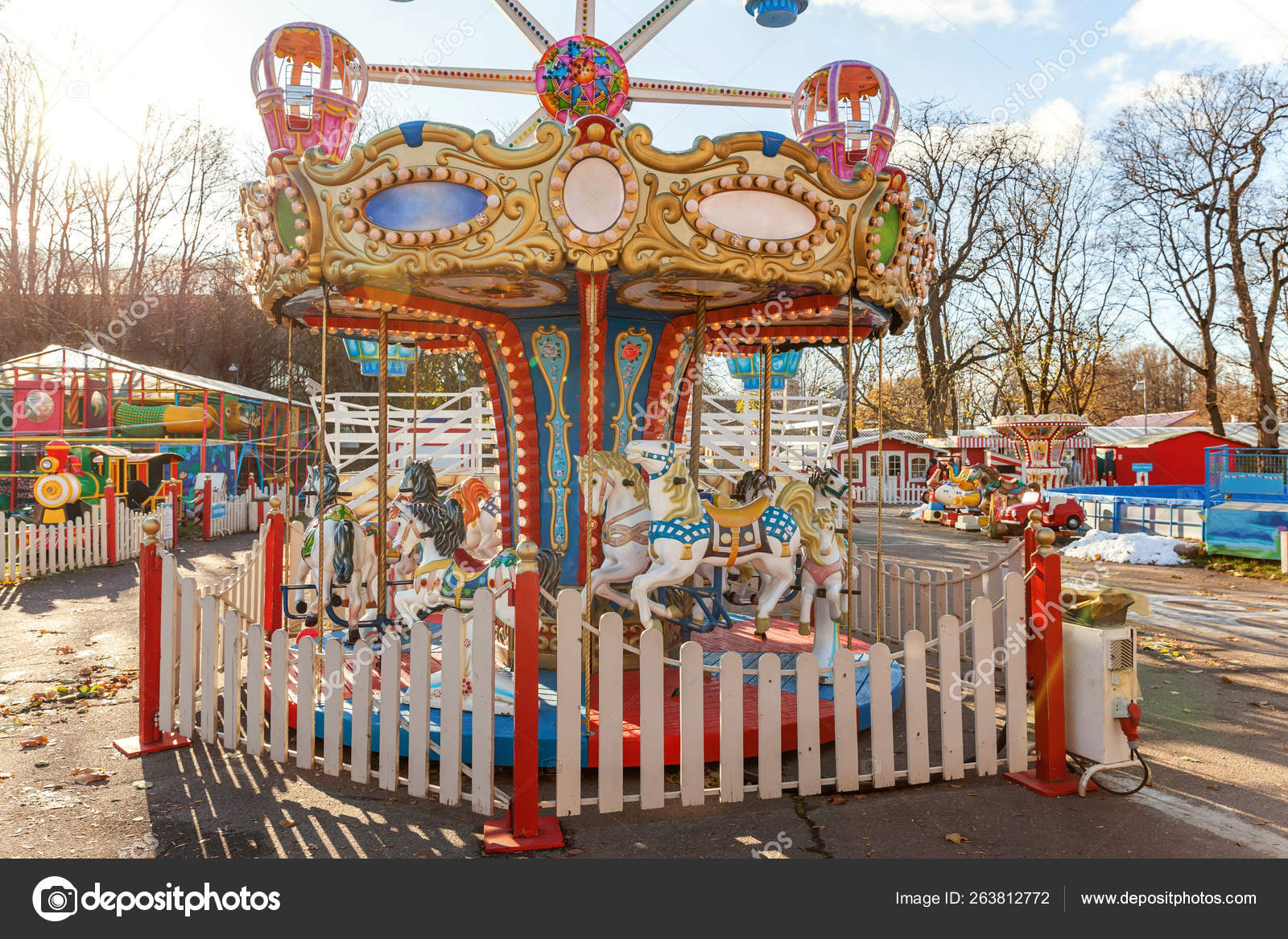 Vintage Merry-Go-Round flying horse carousel in amusement holliday park ...