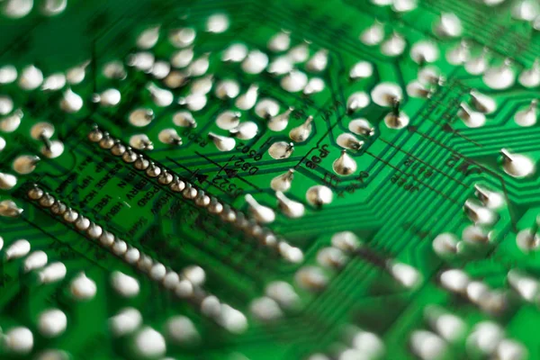 Macro shot of the back side of a circuit board - Stock Image - Everypixel