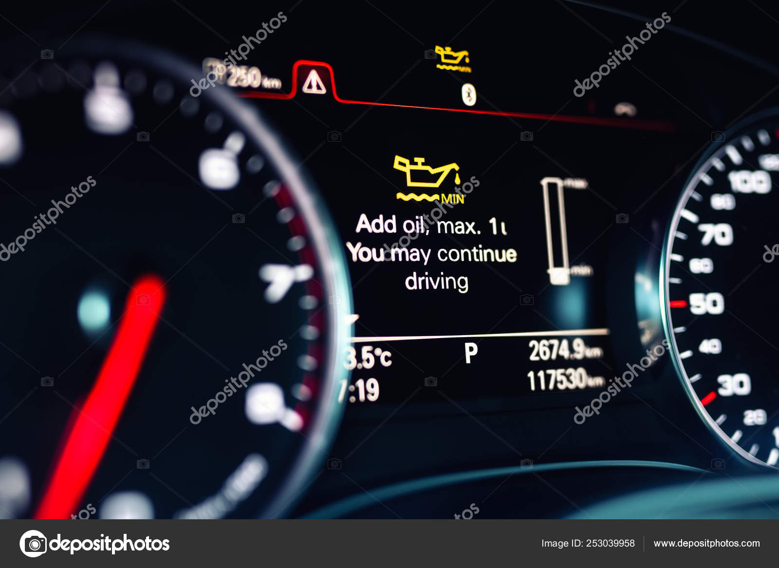 Luxury car color screen dashboard with warning message. Low engine oil ...