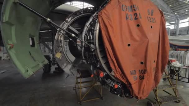 Disassembled jet engine in repair hangar — Stock Video © danr13 #228680354