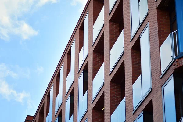 Modern condo building with huge windows - Stock Image - Everypixel