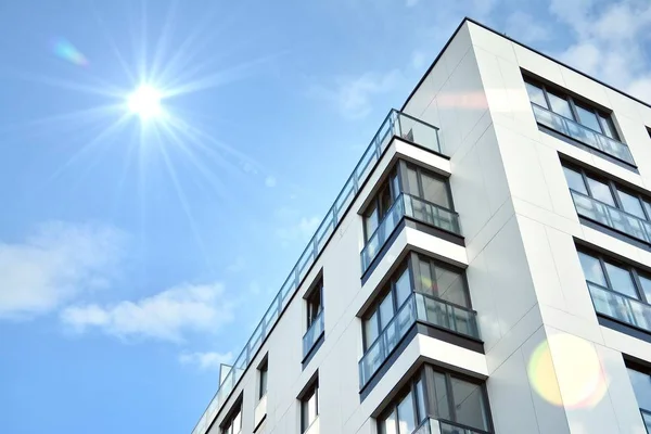 Modern apartment buildings on a sunny day with a blue sky. Facade of a ...