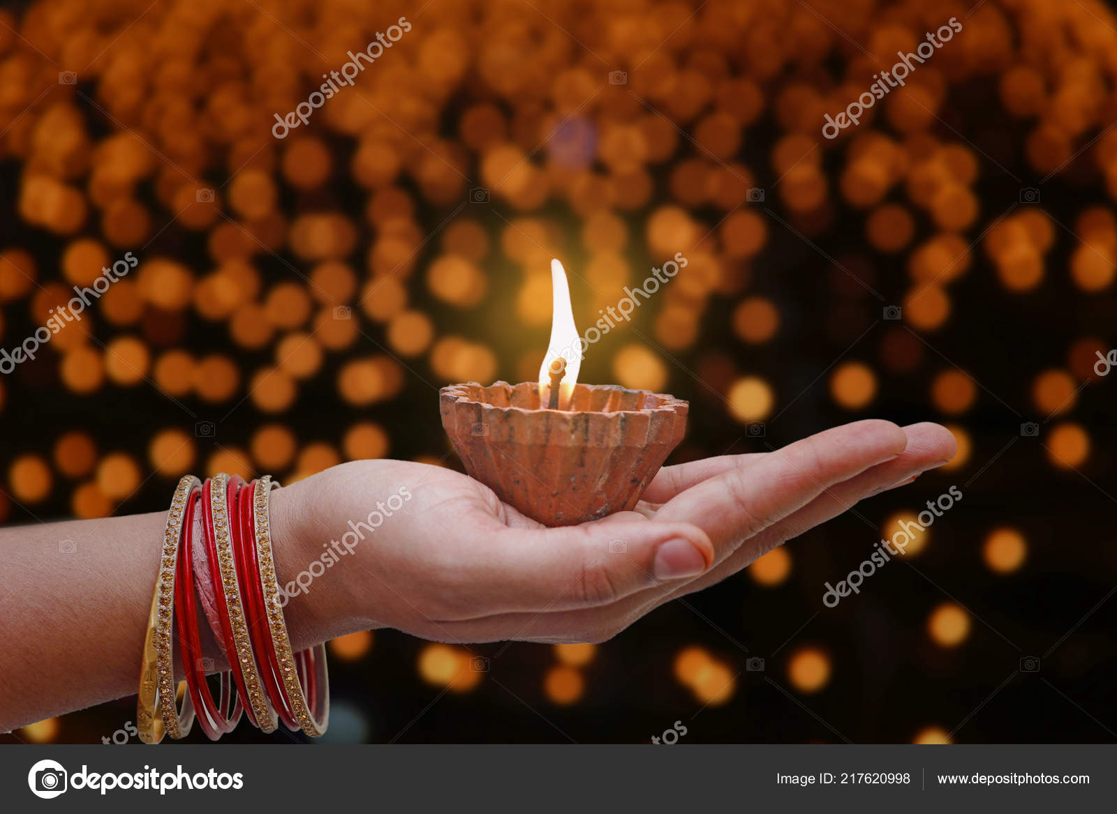 Diwali Oil Lamp In Hand