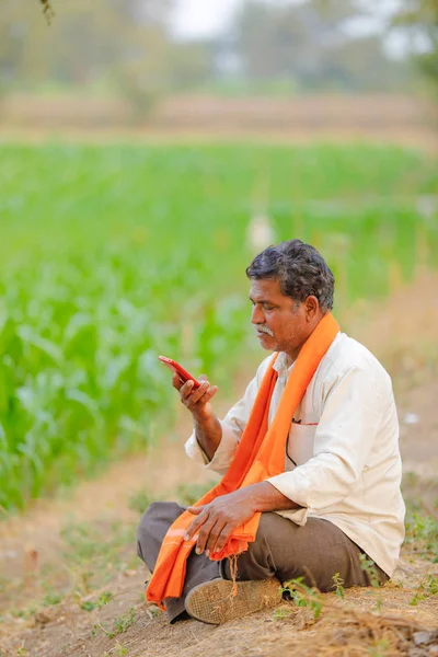 Farmer checking smartphone Stock Photos, Royalty Free Farmer checking ...