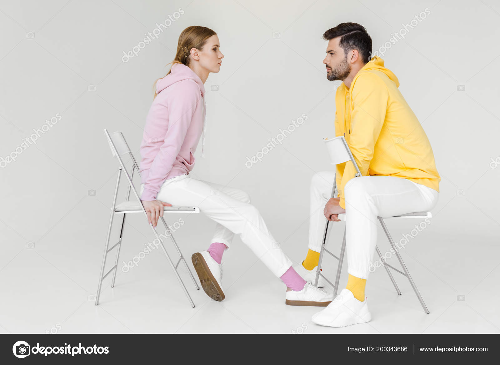 Models On Chairs Side View